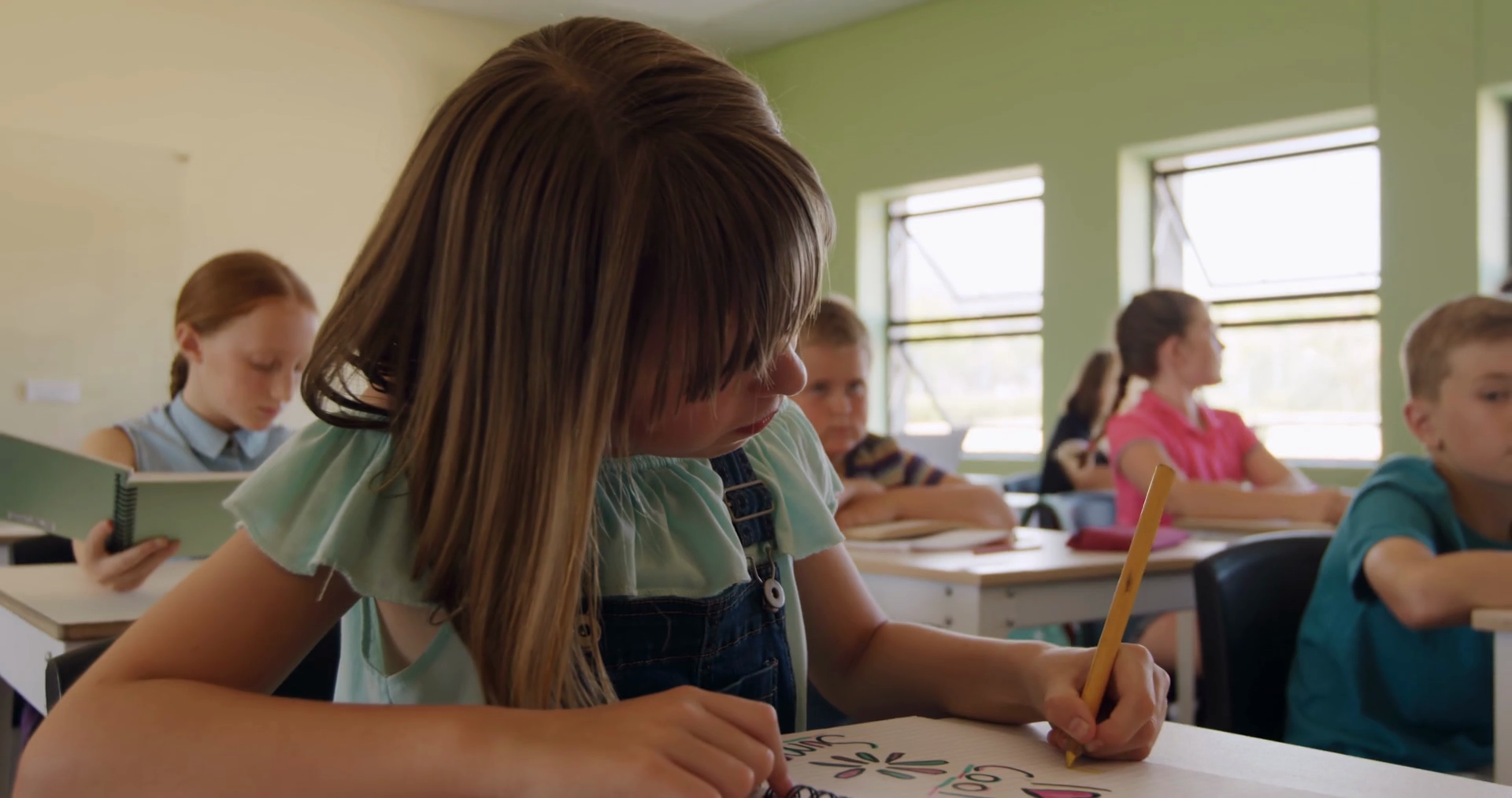 Girl Drawing In Notebook In Class Stock Footage SBV-346592614 - Storyblocks