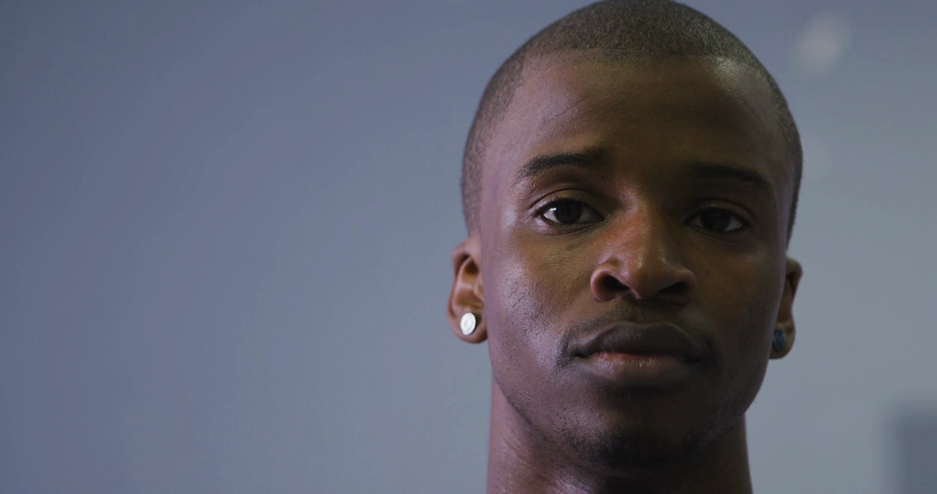 Portrait Of A Mixed Race Modern Male Dancer Looking At The Camera Stock