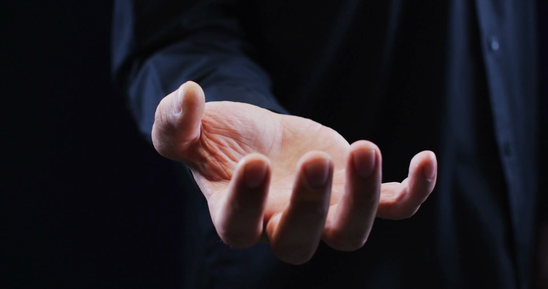Hand of a caucasian man palm up holding an unseen object Stock Video ...