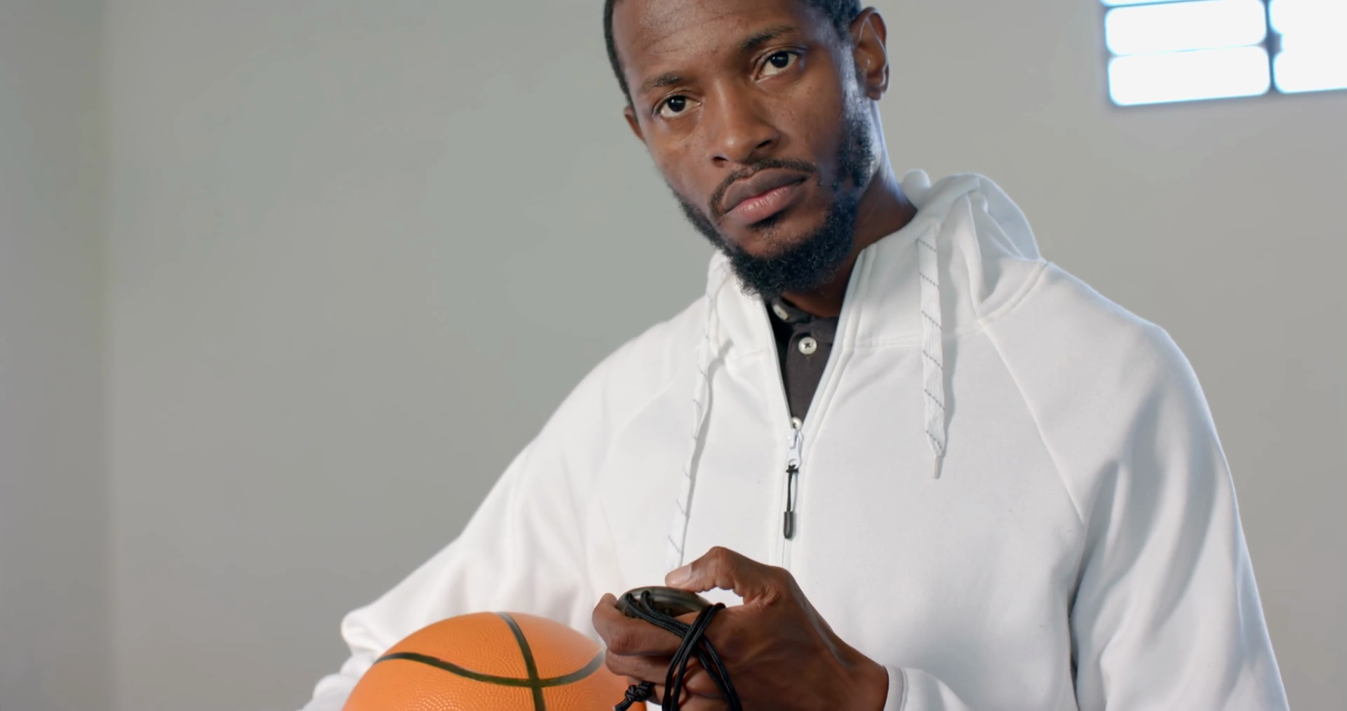 African American Coach Holds Basketball Stock Footage SBV-352032677 ...