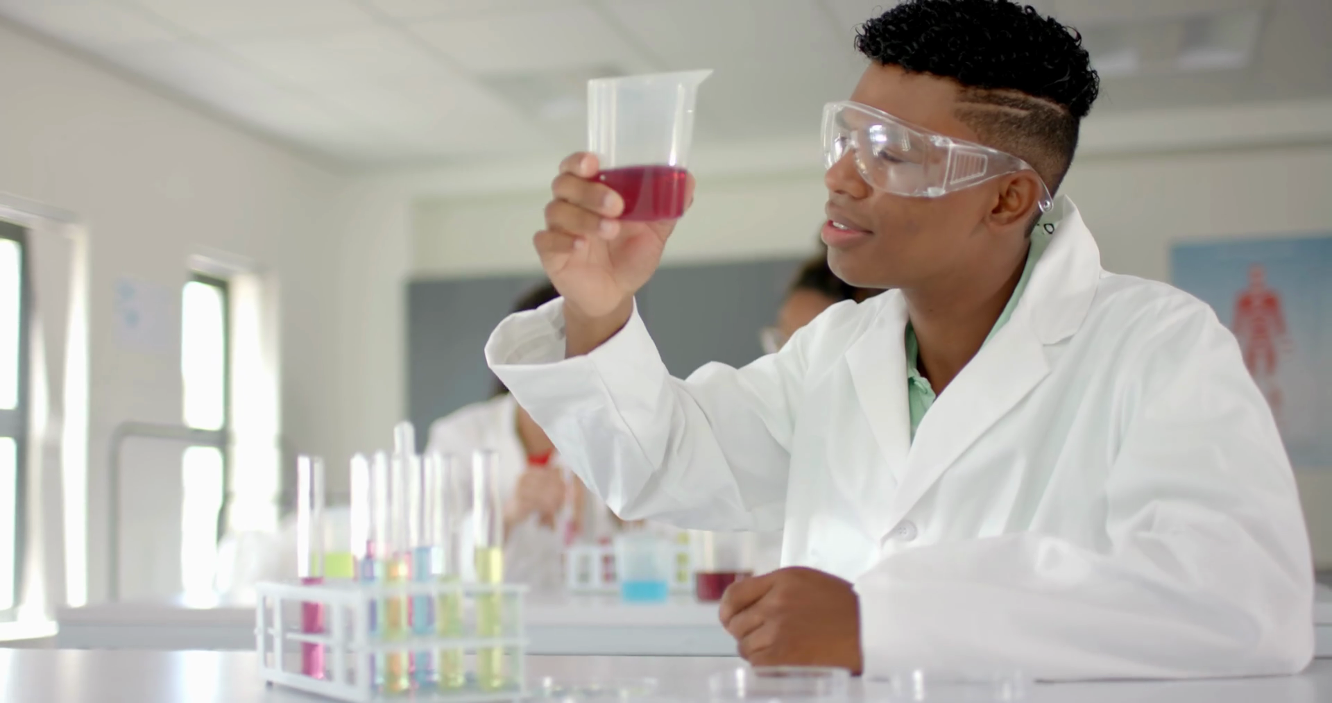 Teenage Boy Examines Test Tube In High Stock Footage SBV-352152907 ...