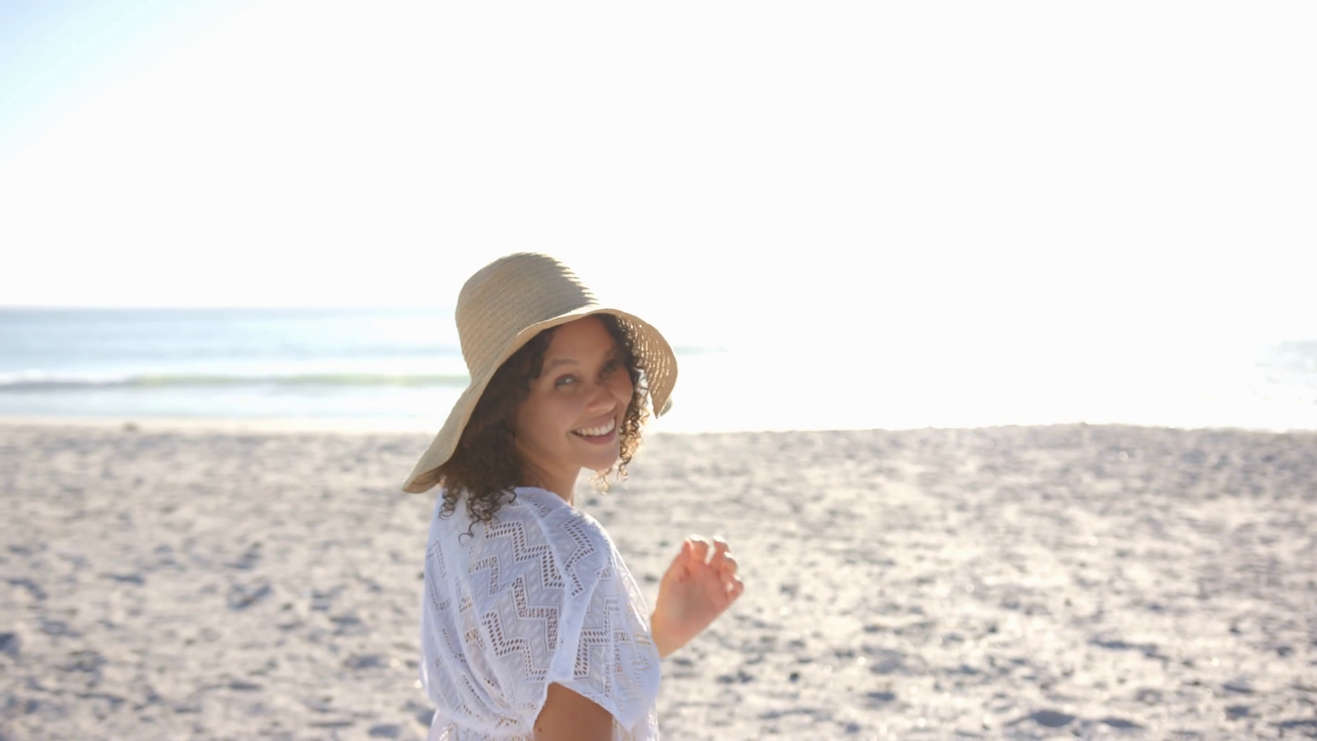 Biracial Woman In White Dress Hat Smiles On Stock Footage SBV-352018747 ...