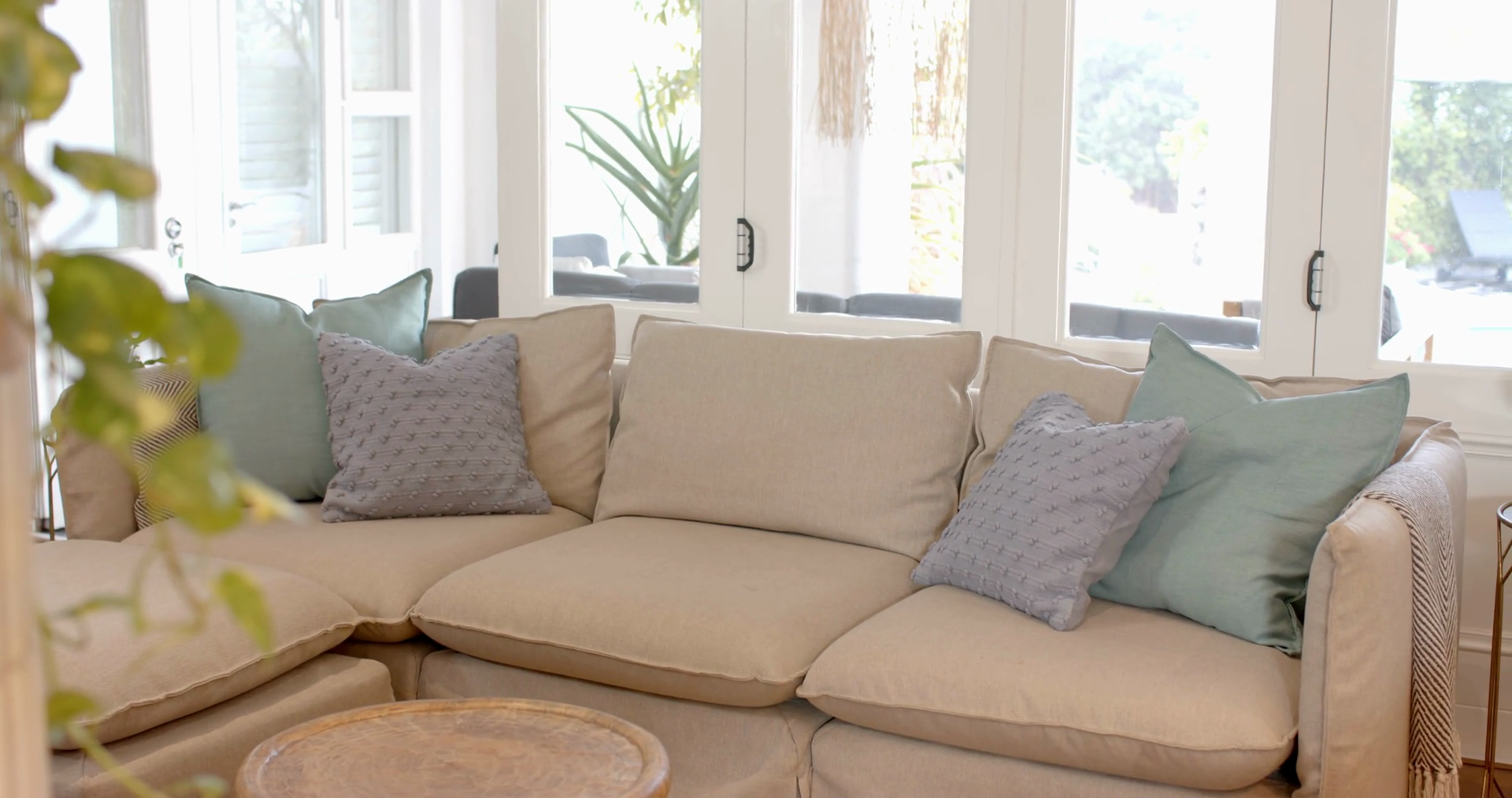 Cozy Living Room With Beige Sectional Sofa Stock Footage SBV-352107053 ...
