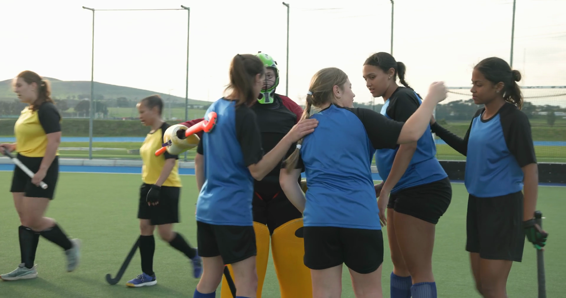 Female Hockey Team Strategizing On Field Stock Footage SBV-352064173 - Storyblocks