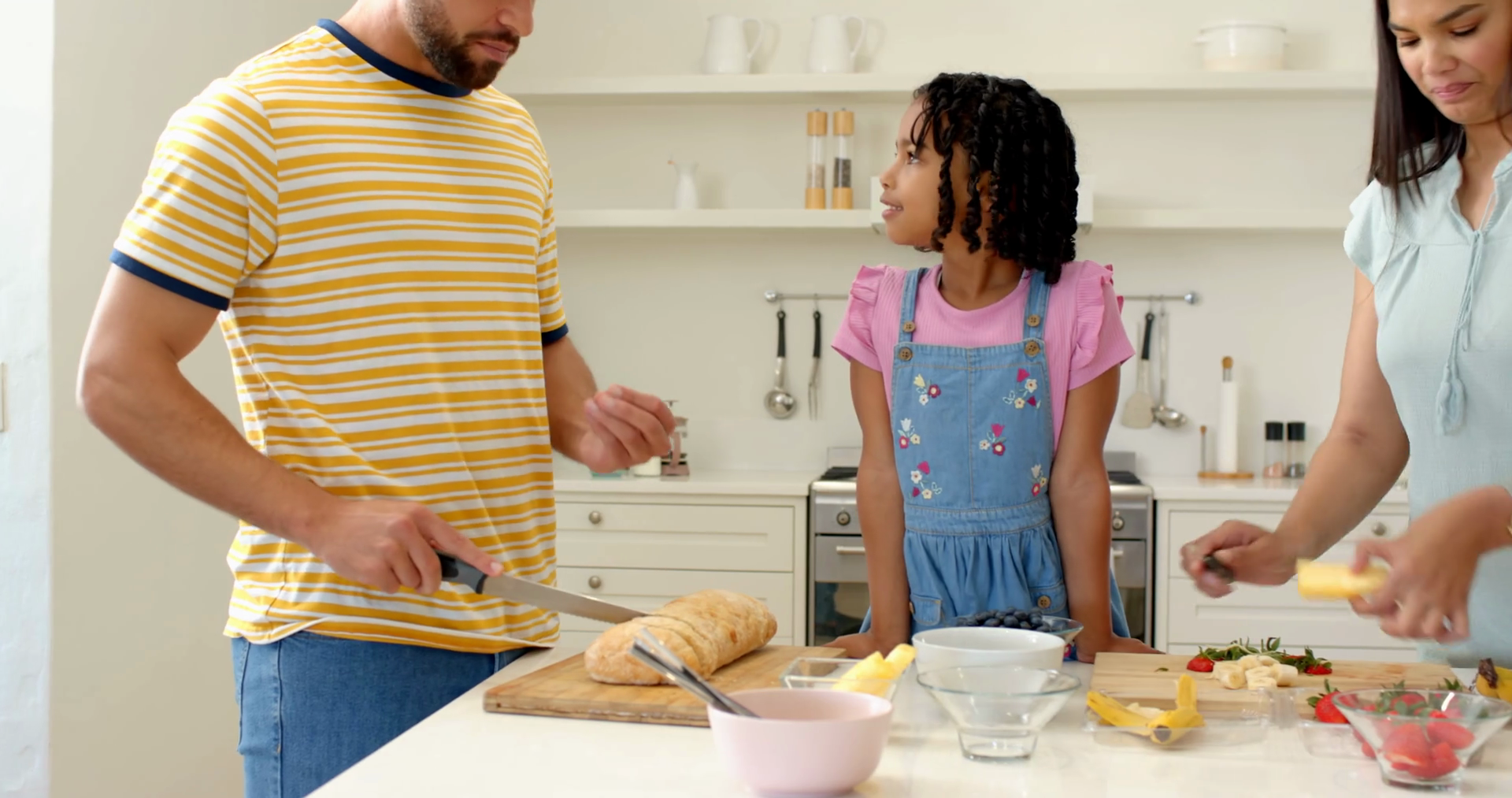 Father Slicing Bread In Kitchen Daughter Stock Footage SBV-352325645 ...