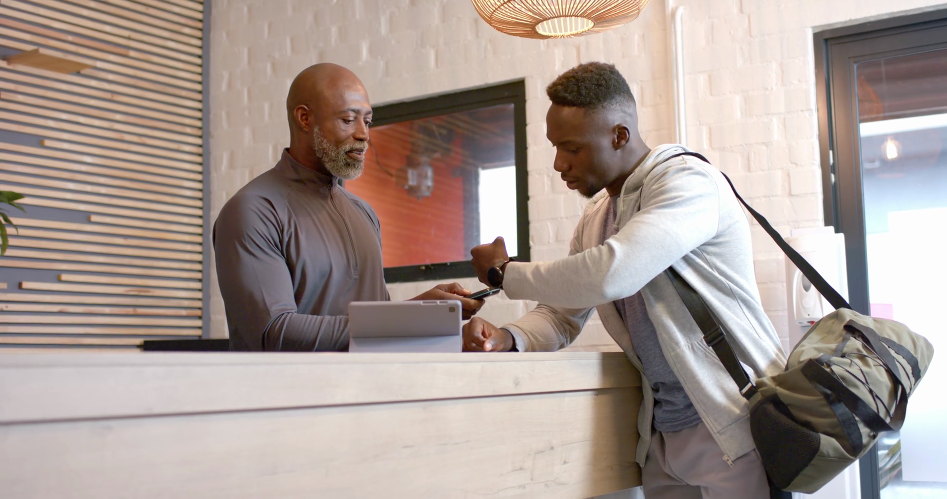 African American Male Guest Checking In Stock Footage SBV-352860656 ...