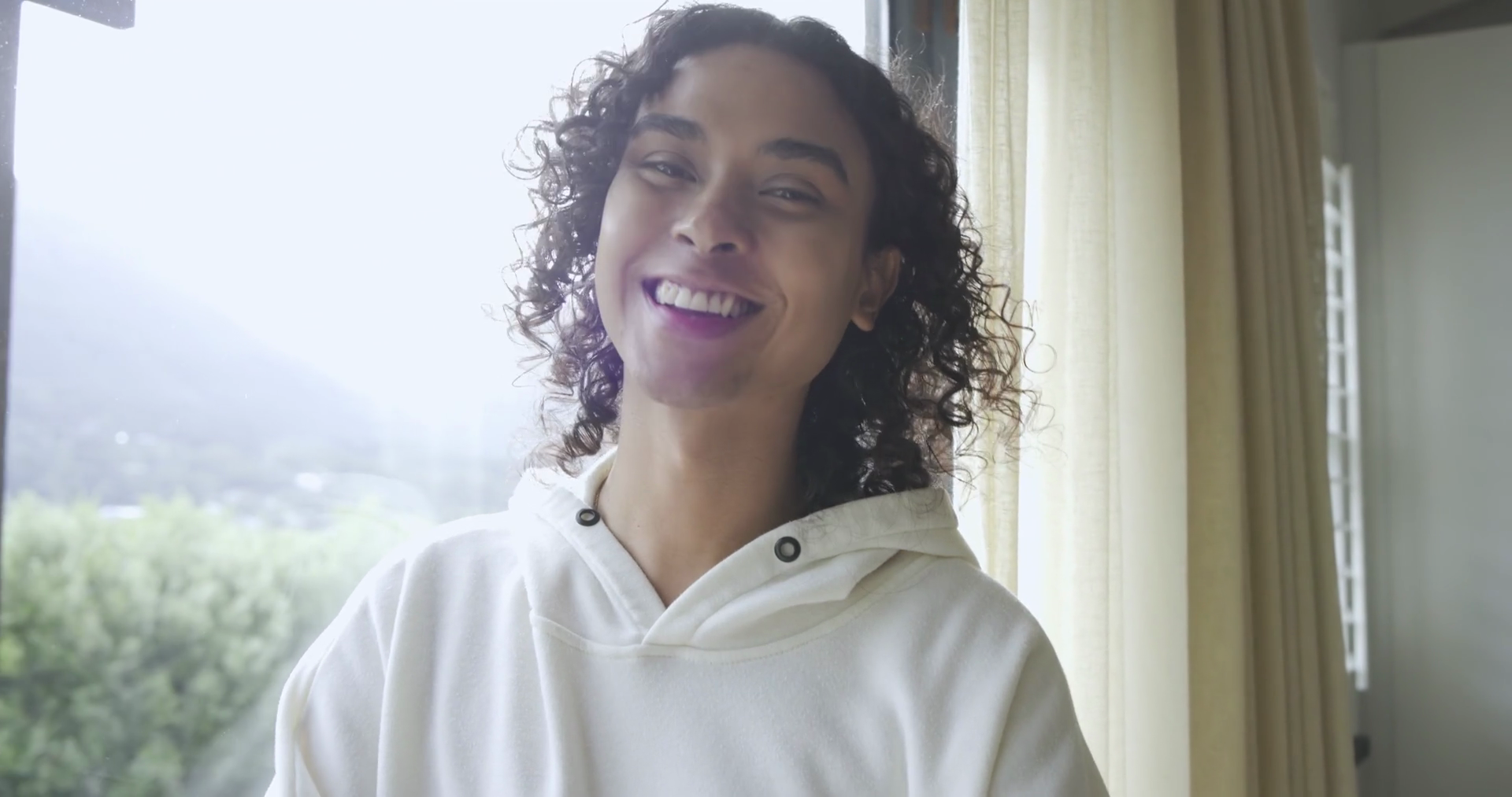 Non-binary Adult In White Hoodie Standing Stock Footage SBV-352861229 ...