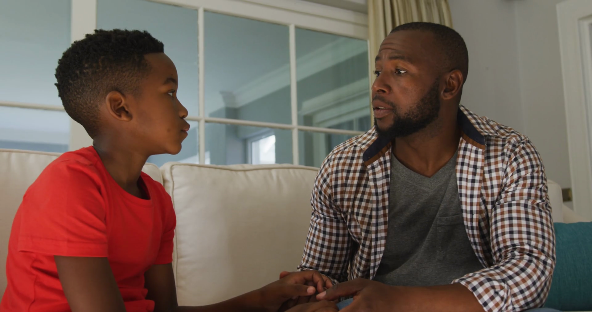 African American Dad Talking To Son Holding Stock Footage SBV-348474110 ...