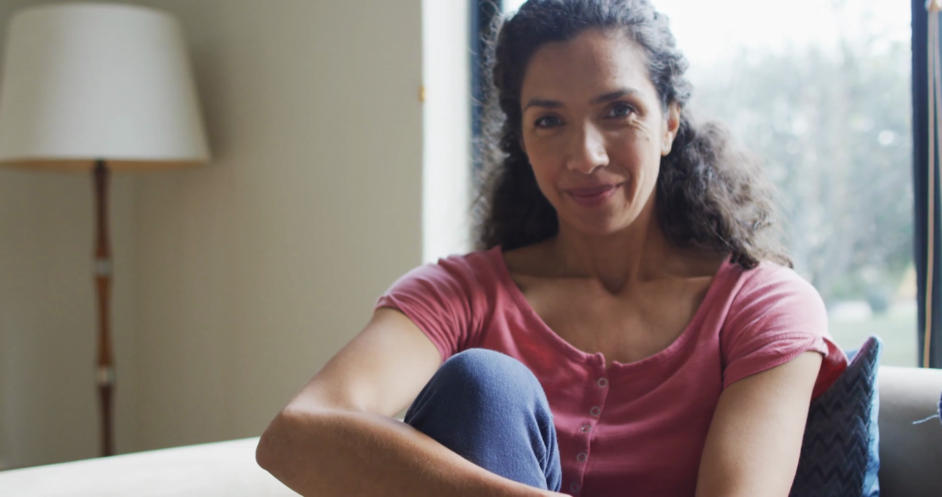 Portrait Of Happy Mixed Race Woman Sitting Stock Footage SBV-348421015 ...