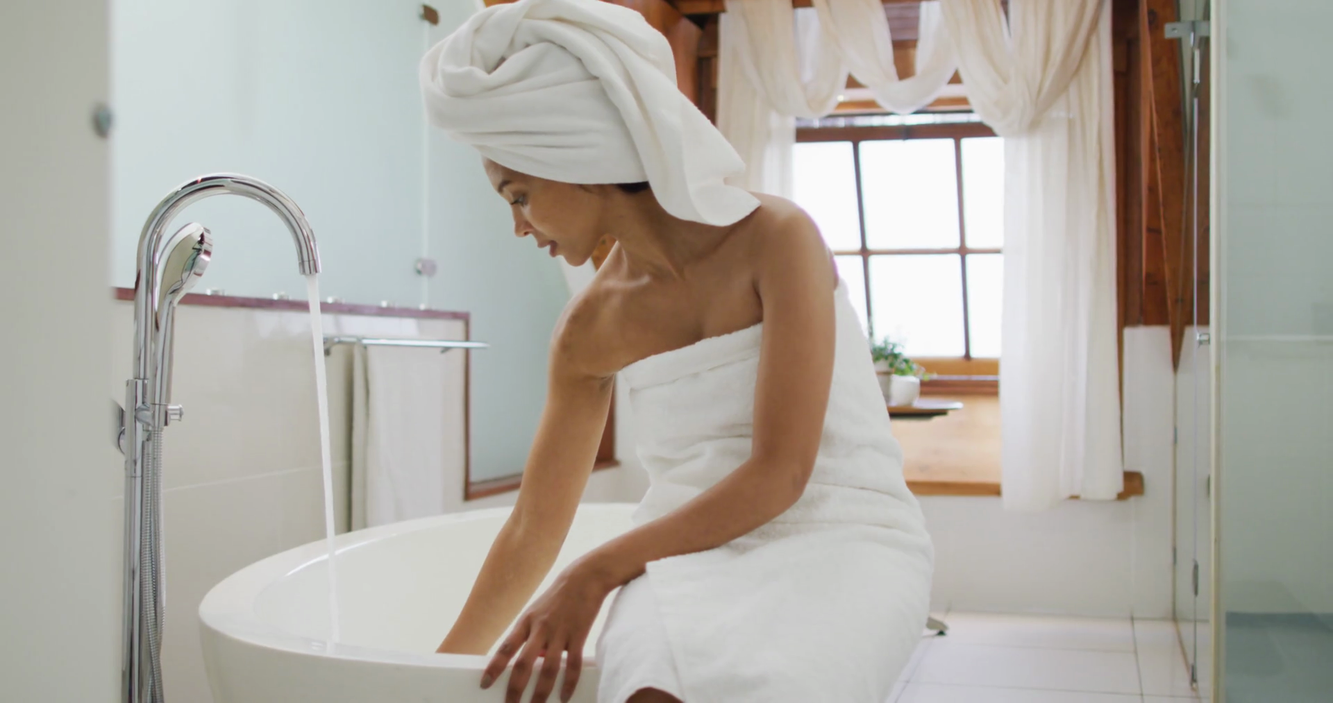 Mixed Race Woman Running Bath Stock Footage SBV-348603618 - Storyblocks