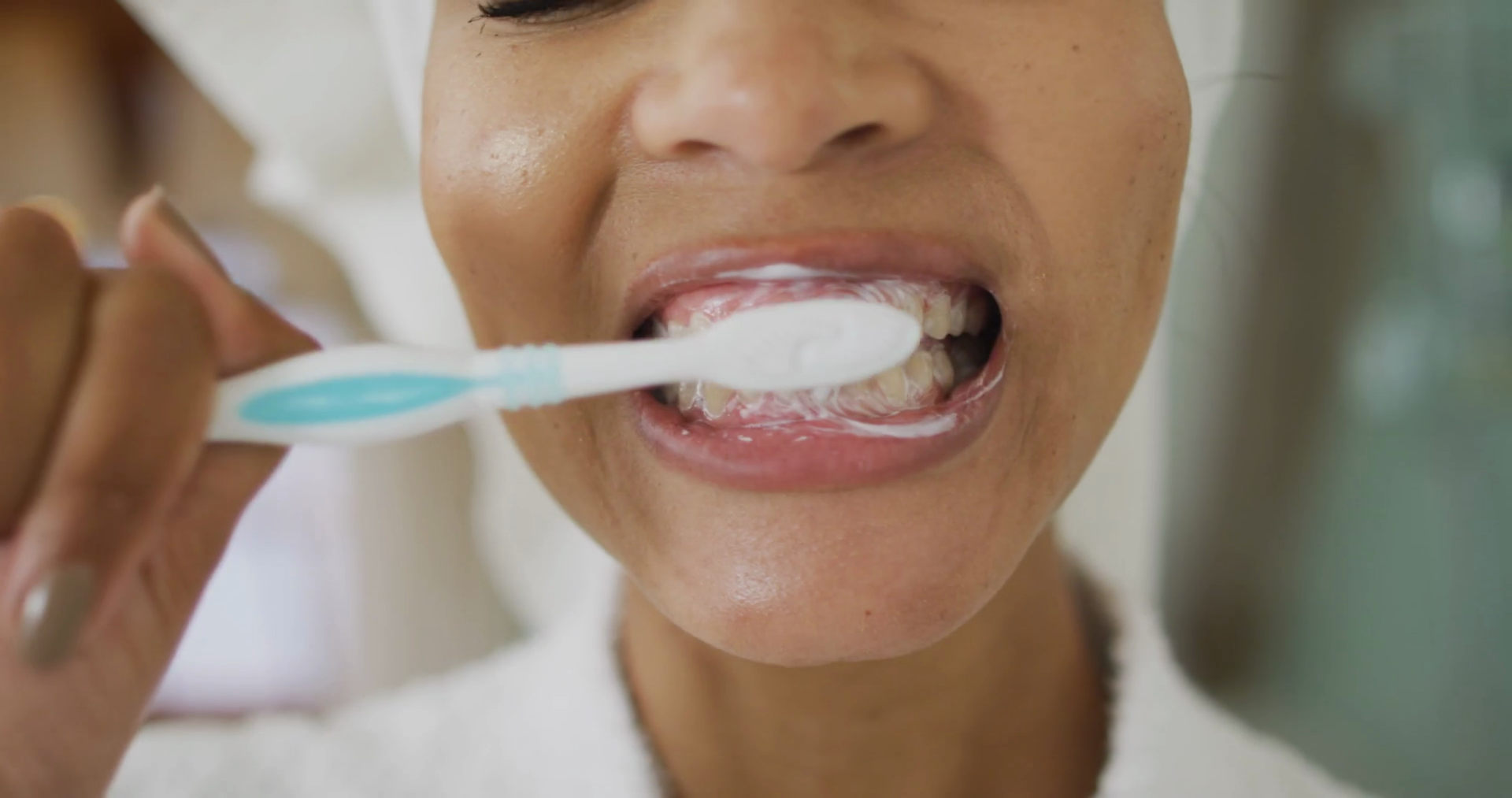 Close Up Of Mixed Race Woman Brushing Teeth Stock Footage SBV-348603619 ...