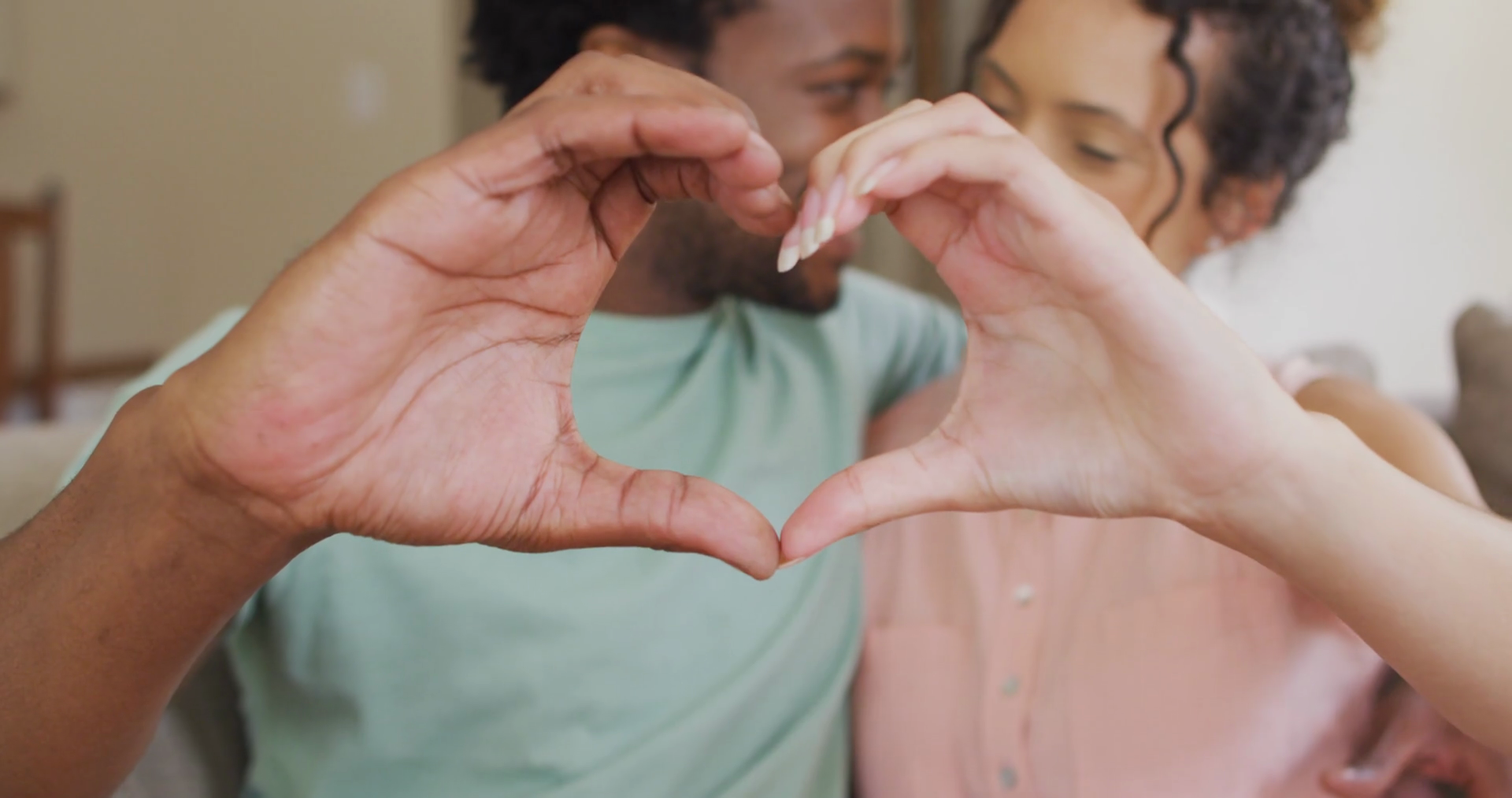 Happy Biracial Couple Gesturing Heart Sign Stock Footage SBV-348472280 ...