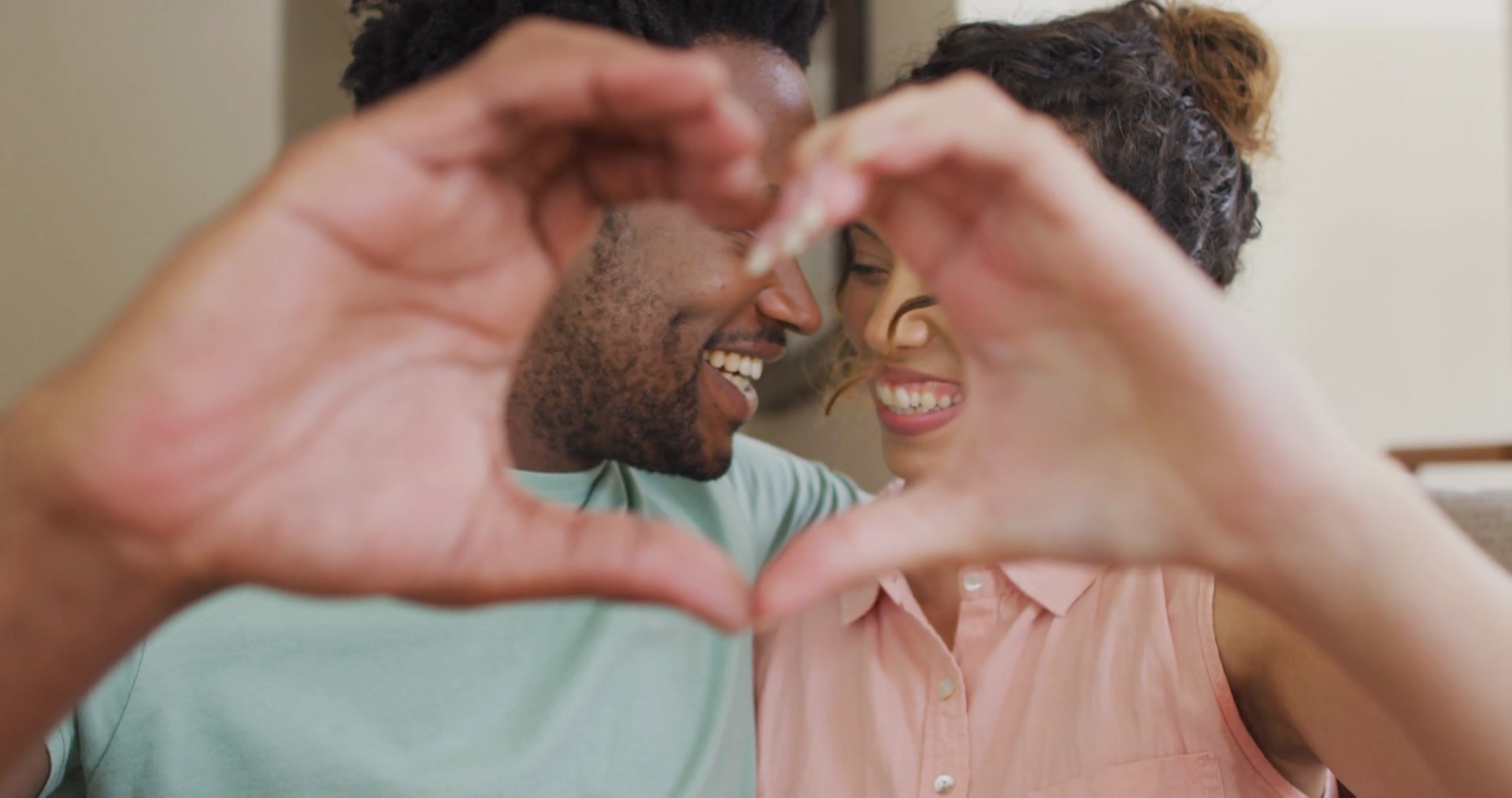 Happy Biracial Couple Gesturing Heart Sign Stock Footage SBV-348475283 ...