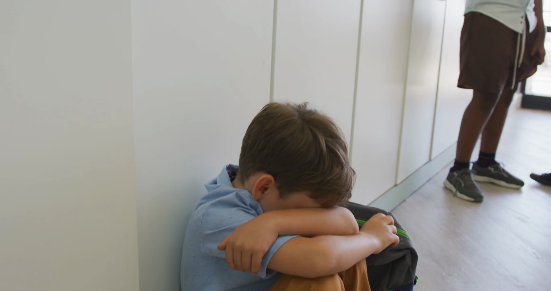 Video Of Sad Caucasian Boy Sitting At School Stock Footage SBV ...