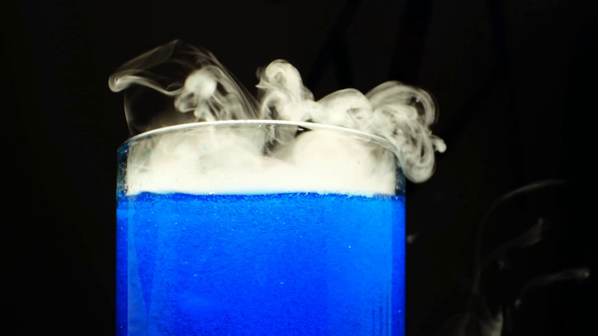 Dissolving Chemicals In A Liquid. Smoke On The Surface Of The Liquid ...