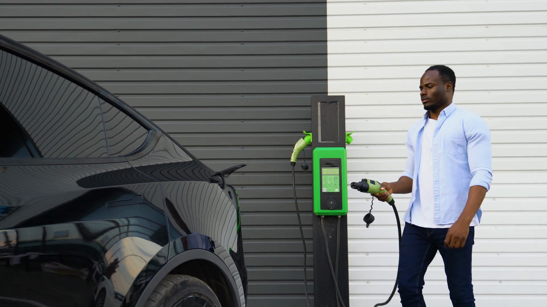 Black Man Plugging In Charging Cable To Stock Footage SBV-352039799 ...
