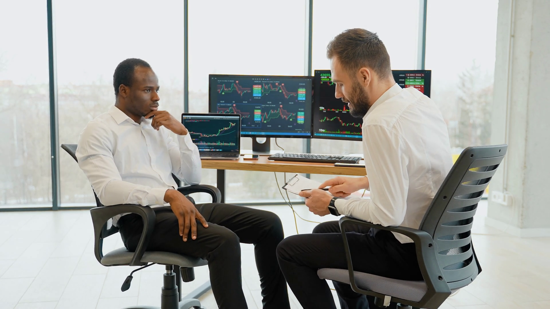 Two Men Traders Sitting At Desk At Office Stock Footage SBV-352933599 ...
