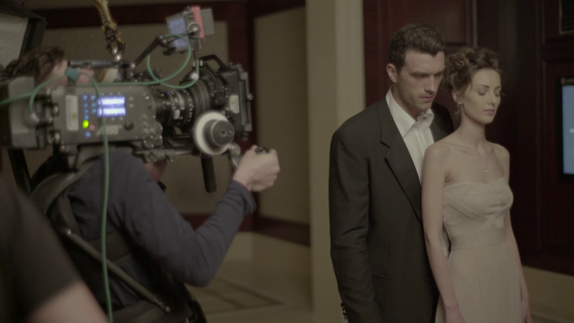 A male actor and female actress plays a role during filming. Stock ...