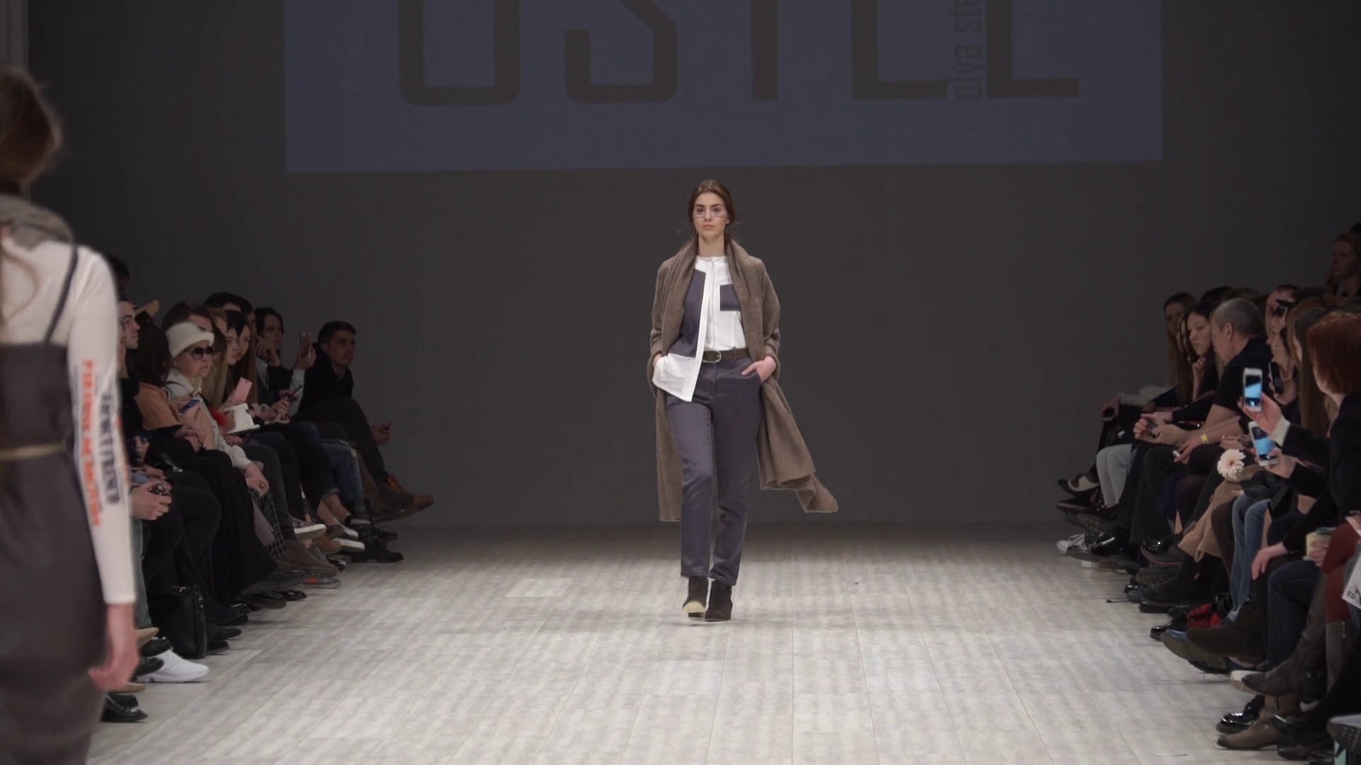 Ukraine, Kyiv : model demonstrates clothes at a fashion show, slow ...