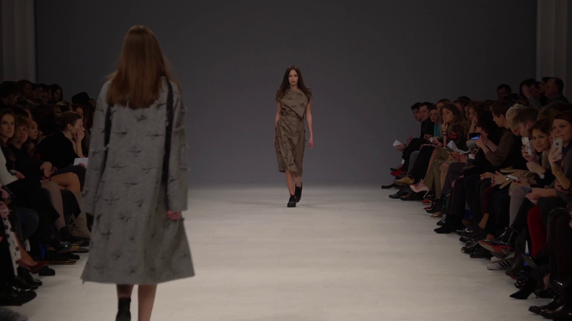 Ukraine, Kyiv : model demonstrates clothes at a fashion show, slow ...