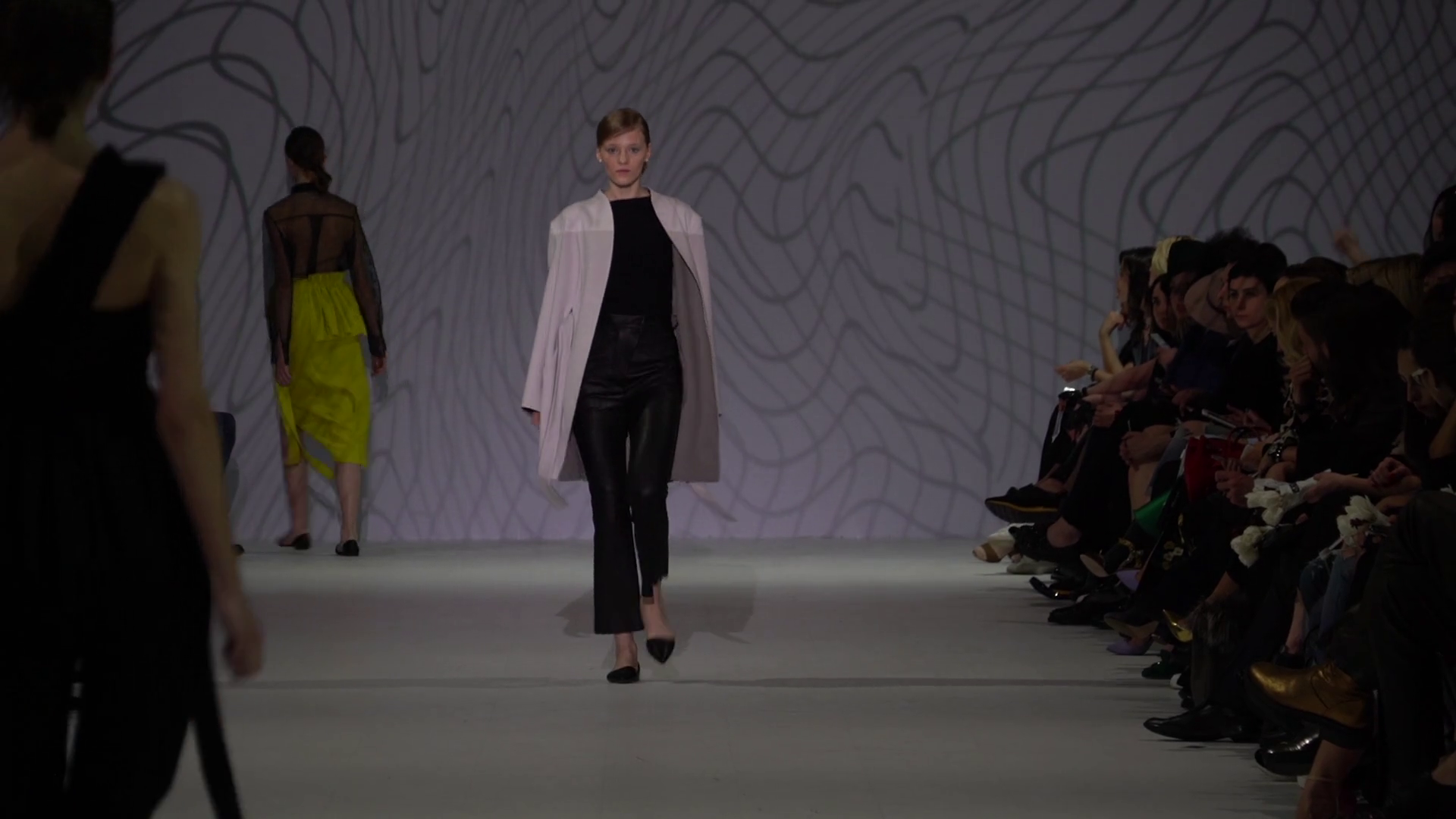 Ukraine, Kyiv : model demonstrates clothes at a fashion show, slow ...