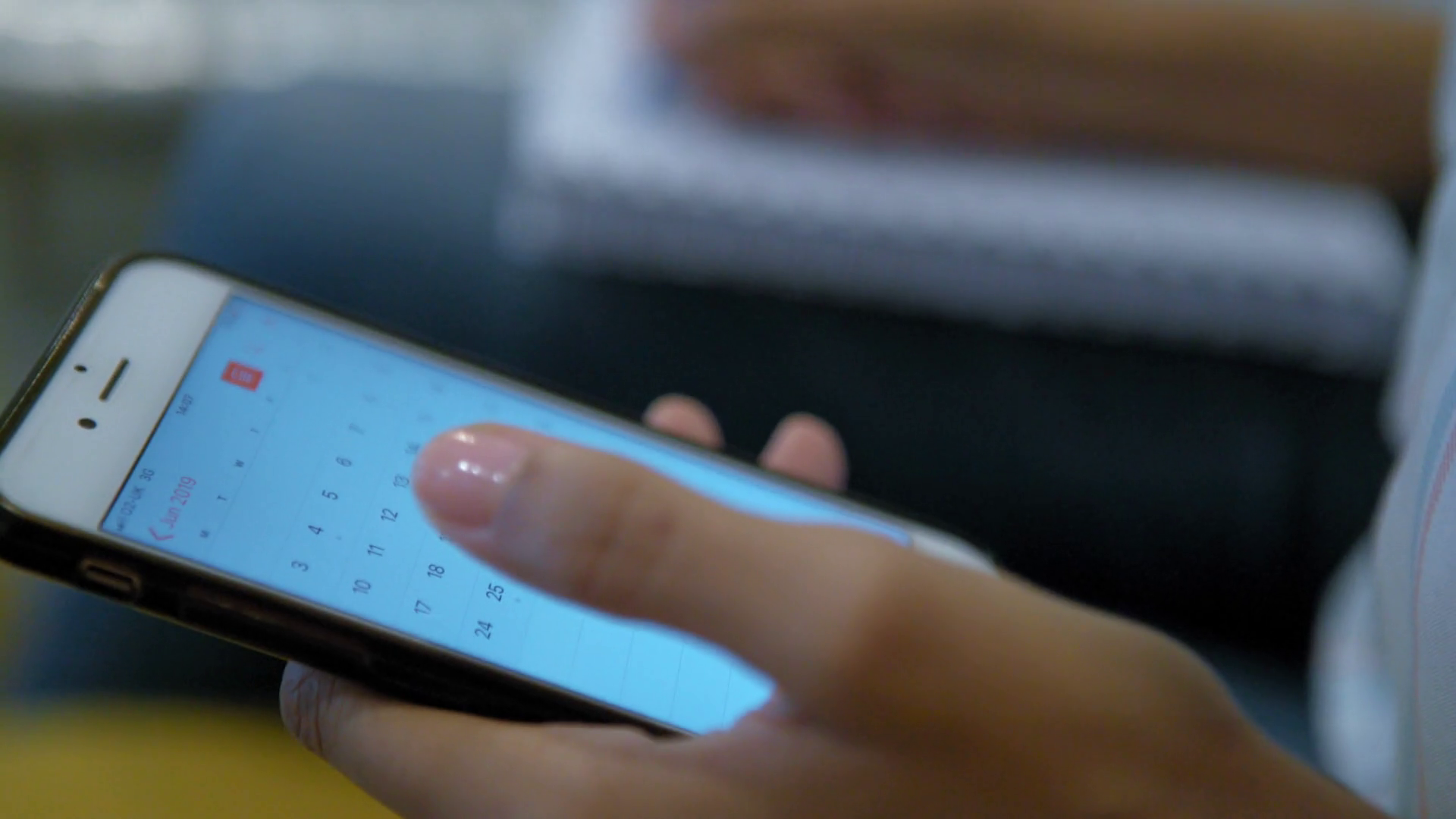 Businesswoman Using Smart Phone Taking Notes Stock Footage SBV ...
