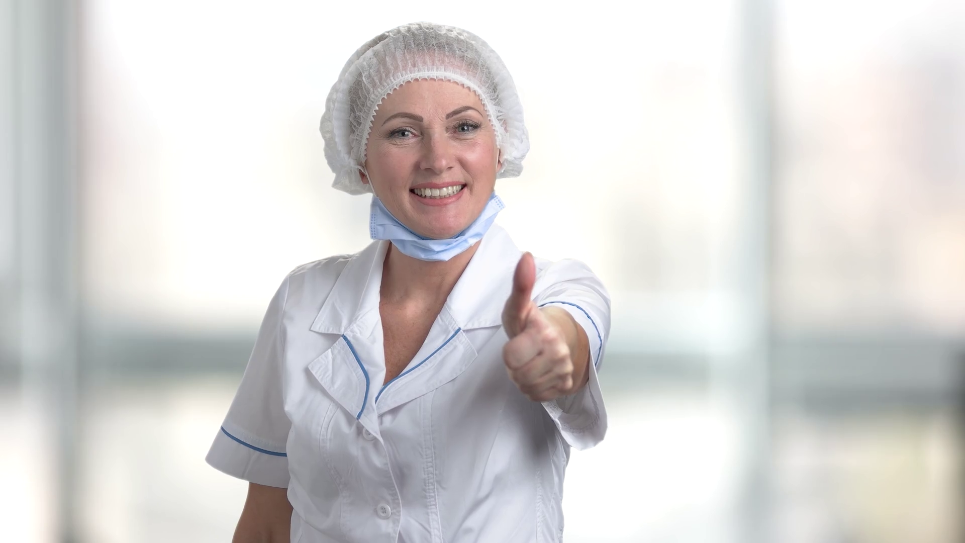 Cheerful Woman Surgeon Giving Two Thumbs Up Stock Footage SBV-324240587 ...