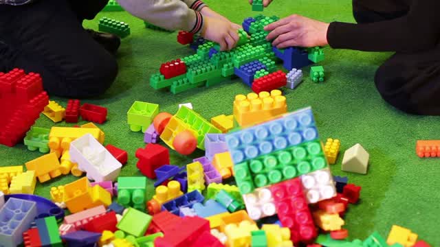 Kids Playing With Lego Blocks Stock Footage: Royalty-Free Video Clips ...