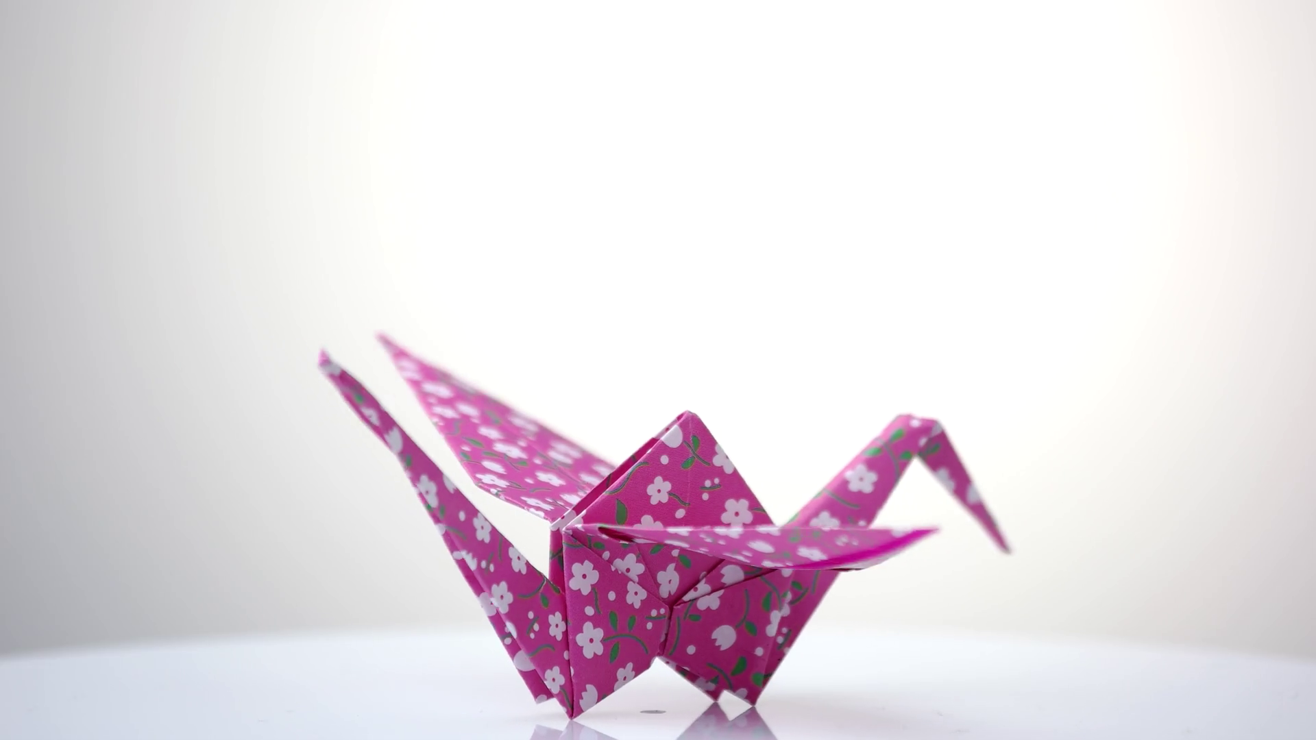 Pink Patterned Orizuru Figurine On White Stock Footage SBV-323044438 ...