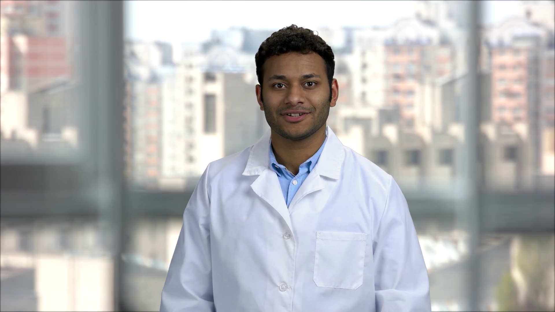 Portrait Of Cheerful Indian Doctor Wearing Stock Footage SBV-338283510 ...