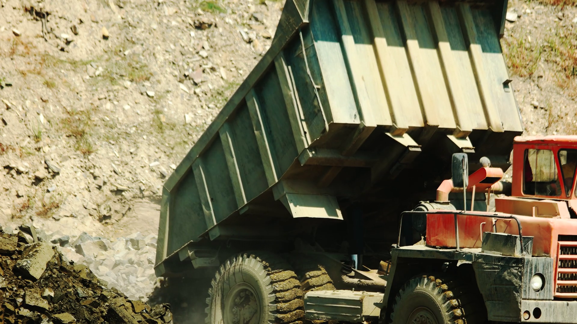 Process of extraction of iron ore in mine. Heavy machinery in mine ...