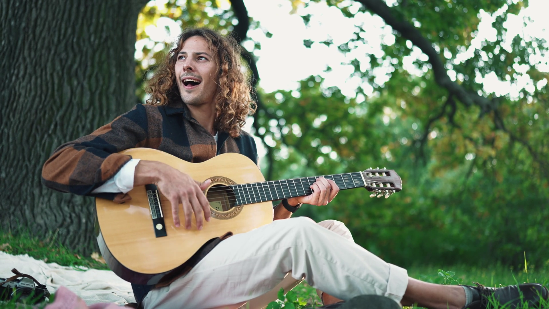 Funny Man Playing On Guitar Singing At Picnic Stock Footage SBV ...