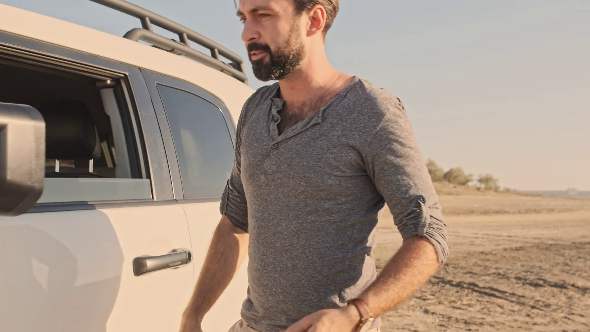 A Handsome Man Is Getting Out Of Suv Car On Stock Footage SBV-352702398 ...