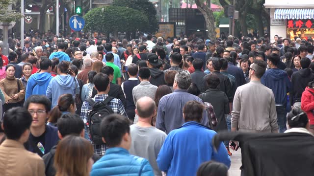 One Person Standing In Crowd Stock Footage: Royalty-Free Video Clips ...
