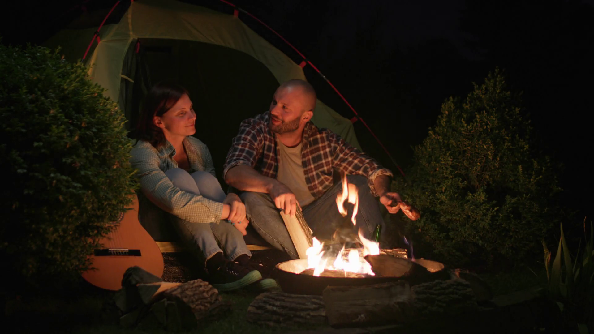 Couple Talking Sitting In Tent Campfire At Stock Footage SBV-348276077 - Storyblocks