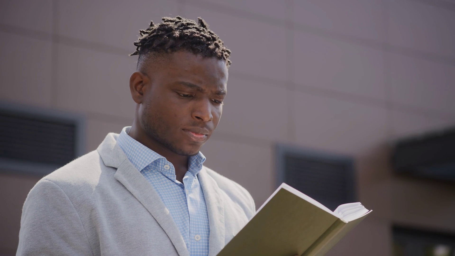 Black Man Reading Book Outside Businessman Stock Footage SBV-348471065 ...