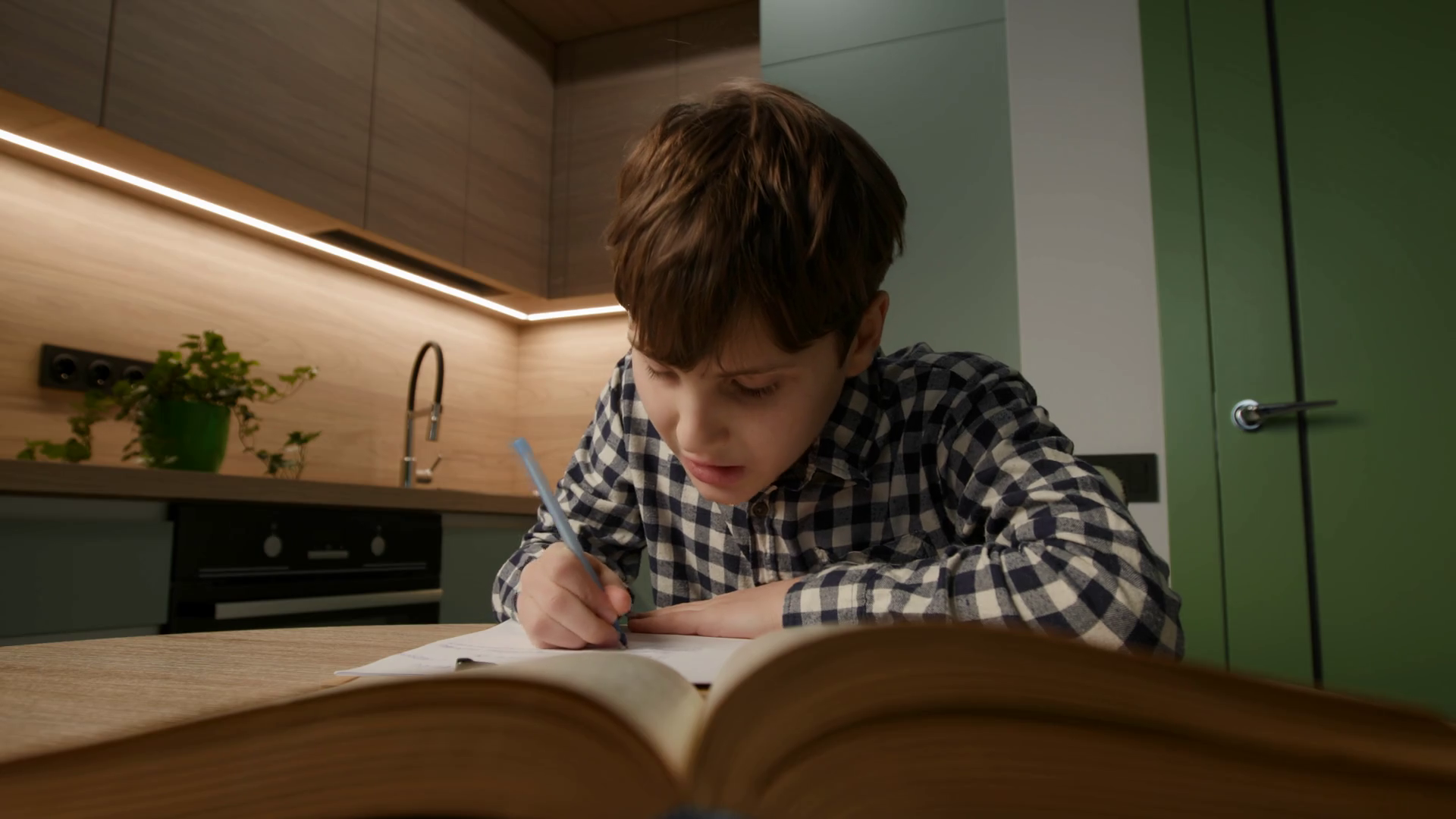 Autistic Boy Engaged In Homework Writing Stock Footage SBV-348759218 ...
