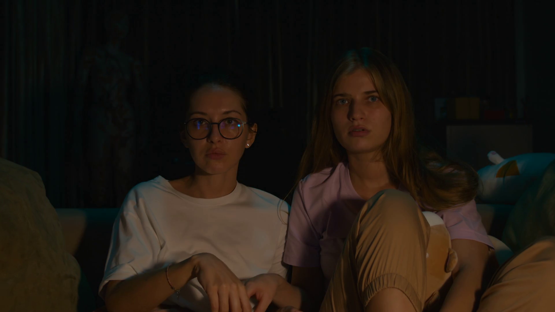Two Girls Sitting On Cozy Sofa At Home Stock Footage SBV-348822624 ...