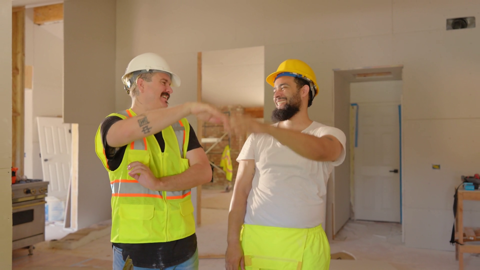 Two Construction Workers Joyfully Stock Footage SBV-352072991 - Storyblocks