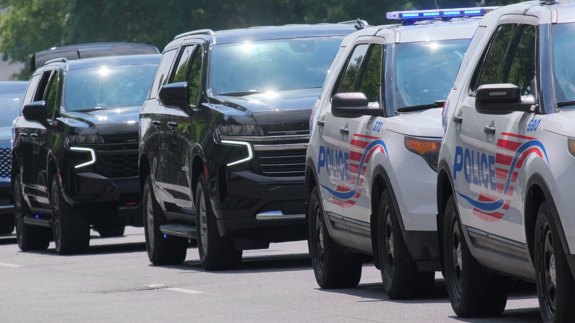 A Convoy Of Police Vehicles Is Driving Down Stock Footage SBV-352588932 ...