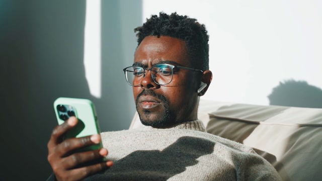 Watching Video Serious Stock Footage: Royalty-Free Video Clips ...