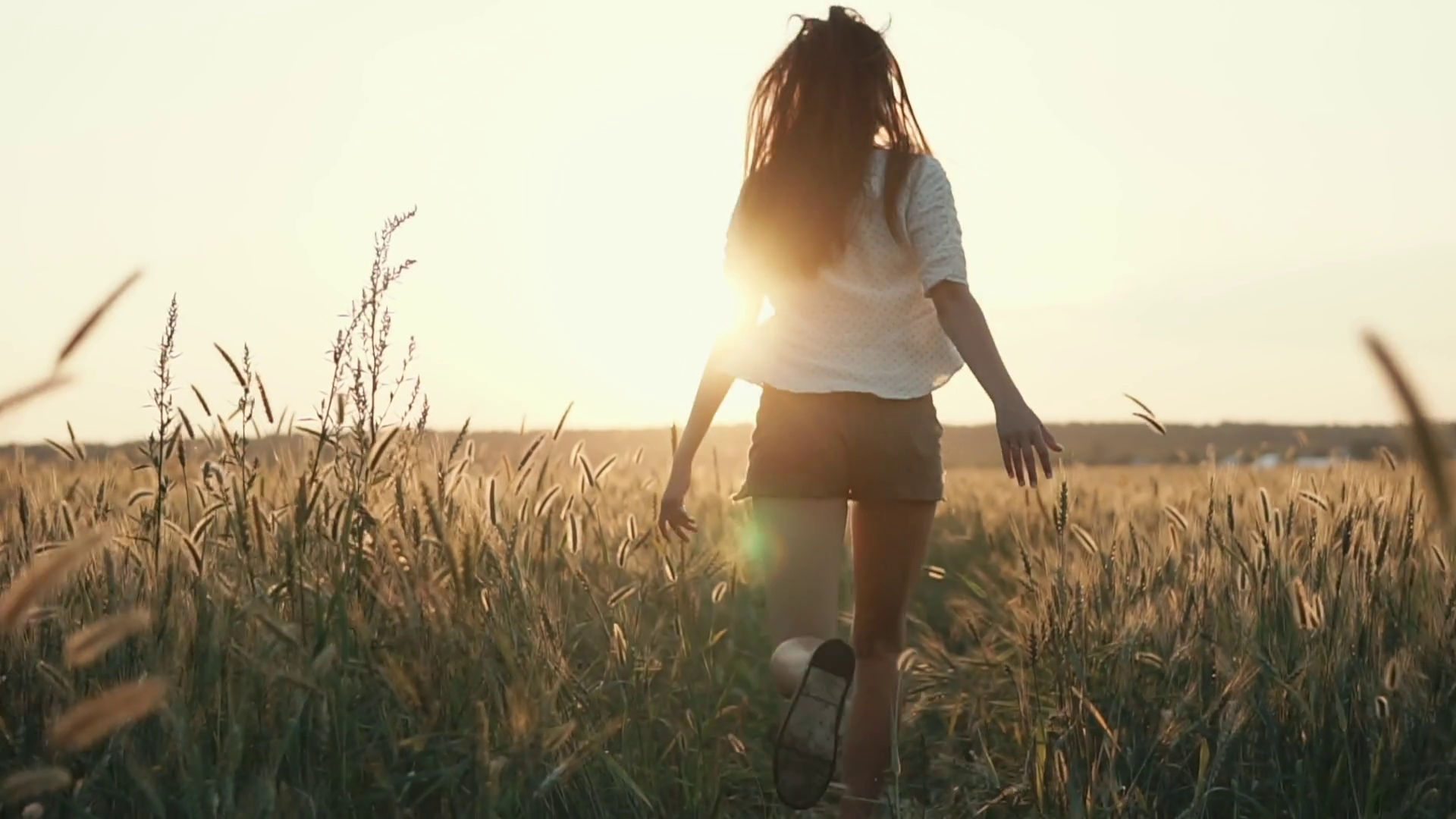 Lovely Girl Running Across Field Stock Footage SBV-338734874 - Storyblocks