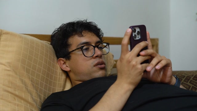 Man Scrolling Tiktok Stock Footage: Royalty-Free Video Clips - Storyblocks