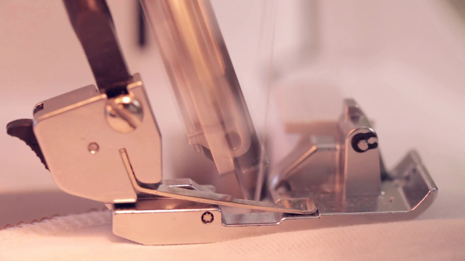 Close up on a sewing machine showing process. Macro Stock Video Footage ...