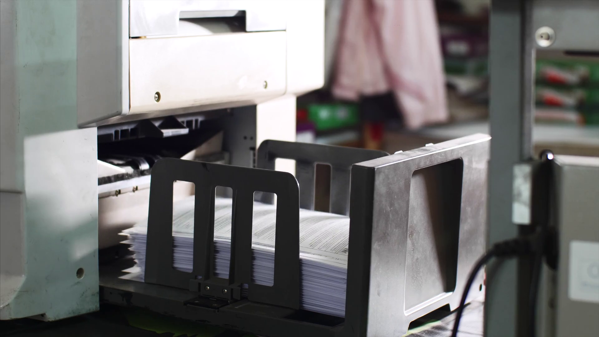 Laser print machine printing on big sheets of paper in typography ...