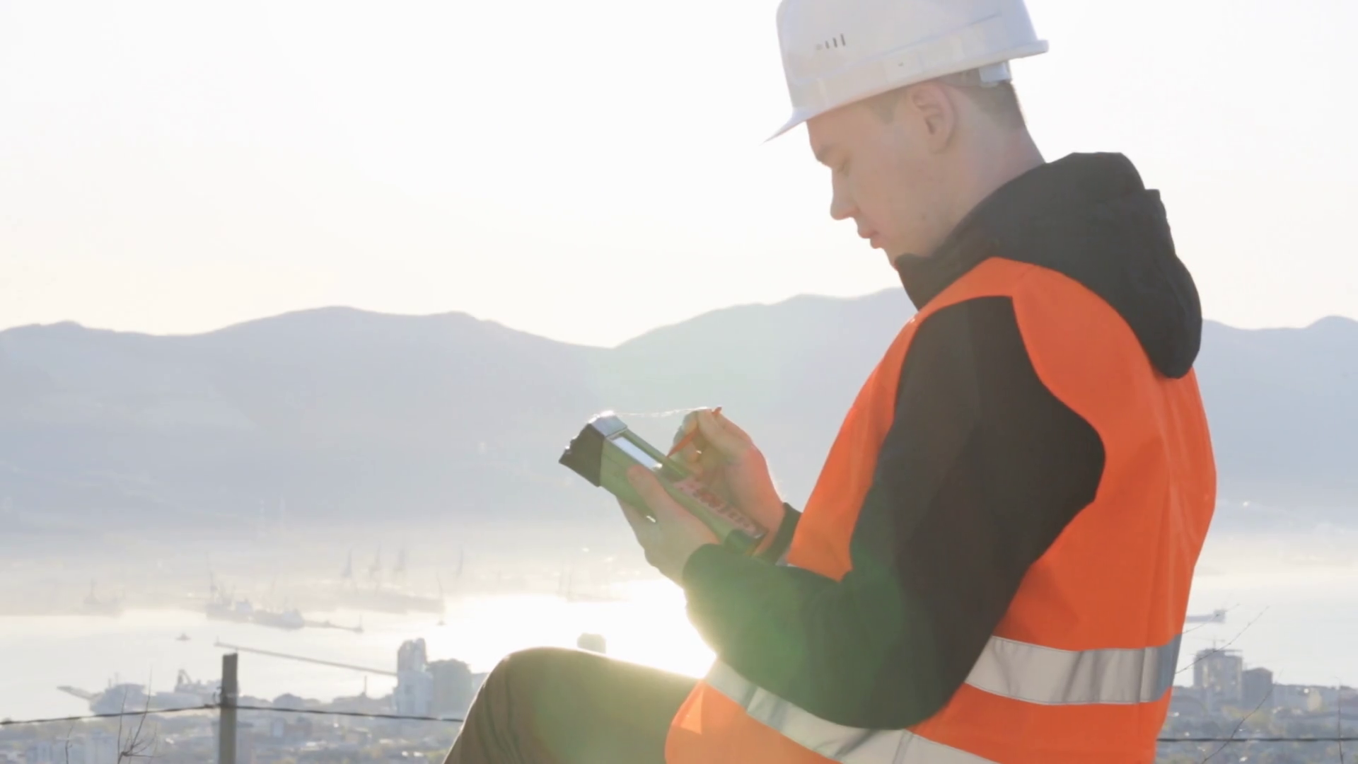 Surveyor In Helmet Orange Vest Sitting Stock Footage SBV-314766546 ...