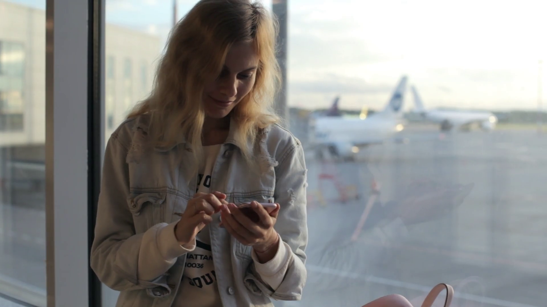 Woman Using Smartphone At Airport With Stock Footage SBV-316942081 ...