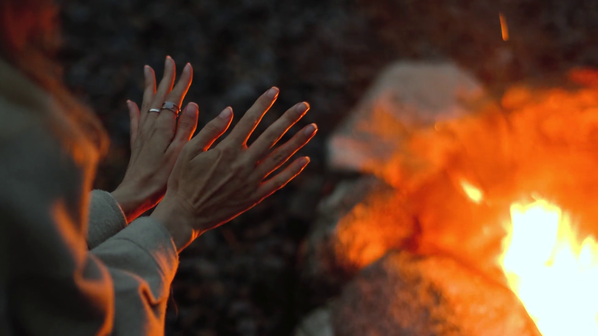 Close-up Of Woman Warming Hands Fire At Dusk Stock Footage SBV ...
