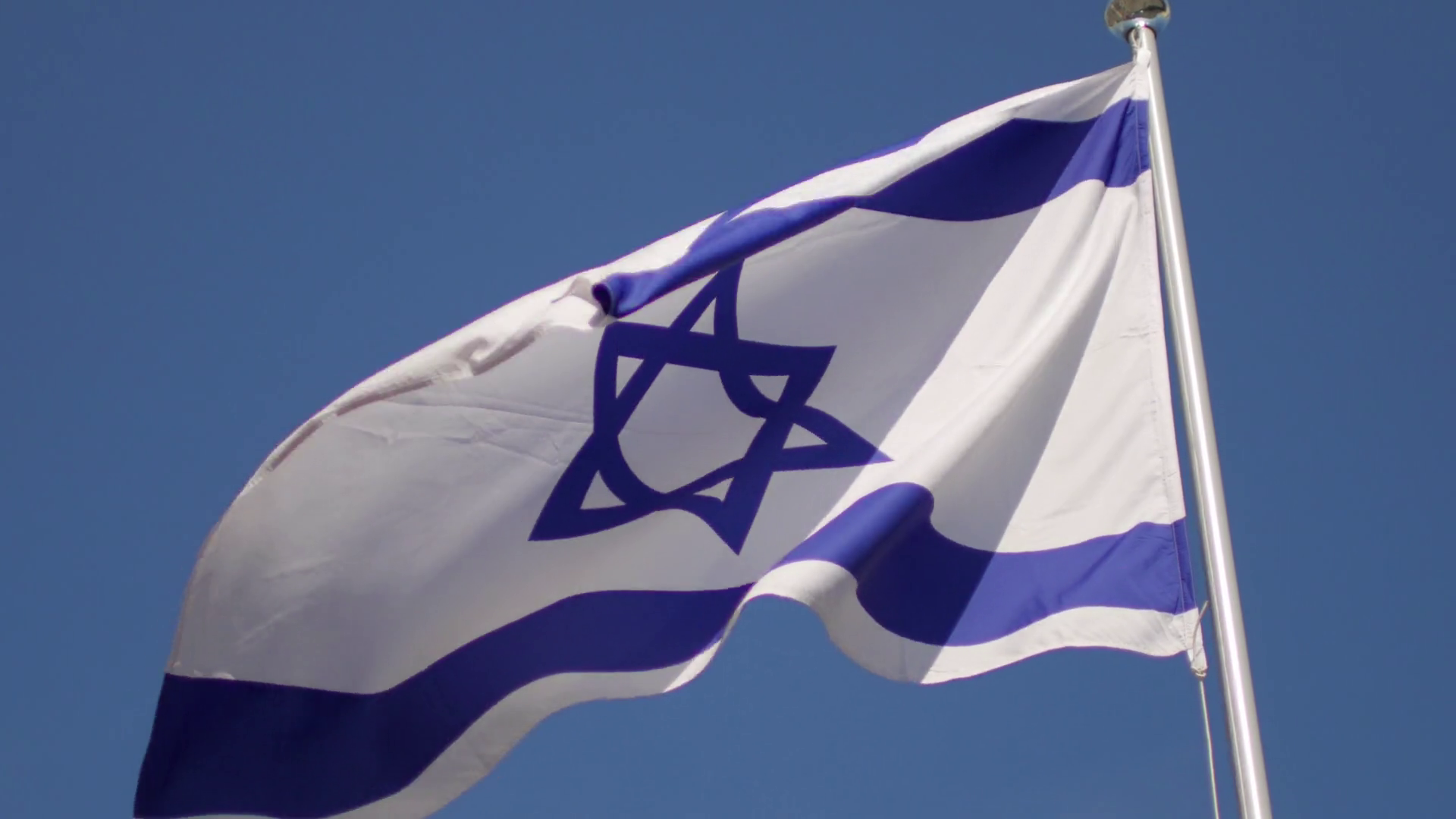 Israeli Flag Is Developing Against Blue Sky Stock Footage SBV-323597912 ...