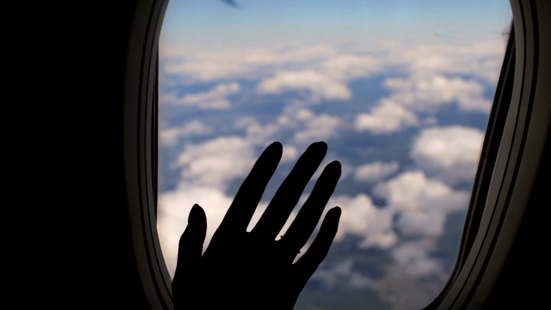Silhouette Of Female Hand On Airplane Window Stock Footage SBV ...